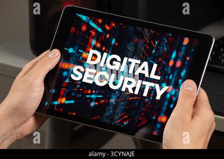Holding futuristic tablet, security concept Stock Photo - Alamy