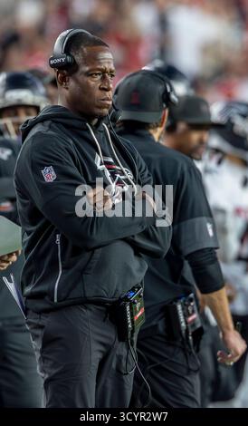 Atlanta Falcons head coach Raheem Morris laughs on the field before an ...
