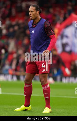 Liverpool's Virgil van Dijk warms up before the Premier League match at ...