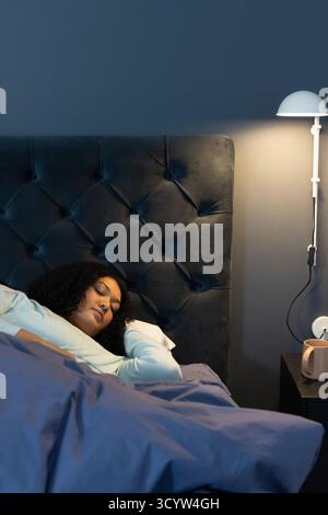 Gray pillow on blue bed decoration in bedroom interior Stock Photo - Alamy