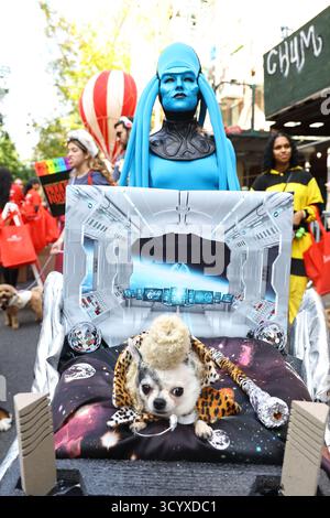 A woman is dressed as Diva Plavalaguna and her dog is Ruby Rhod from ...