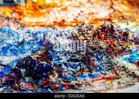 Purple paint oil surface close up view Stock Photo - Alamy