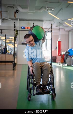 Young man doing therapy after war smiling positive doing ok sign with ...