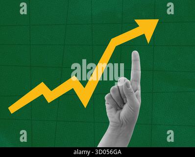 Financial growth concept with hand pointing to rising arrow over stacks ...
