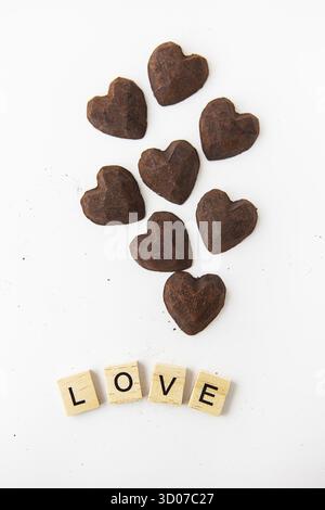 Concept of sweets with chocolate candies on white background Stock ...