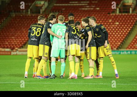 Manchester United team huddle during the Premier League match ...