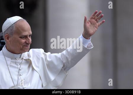Pope Leo XIV waves as he arrives for his weekly general audience in St ...