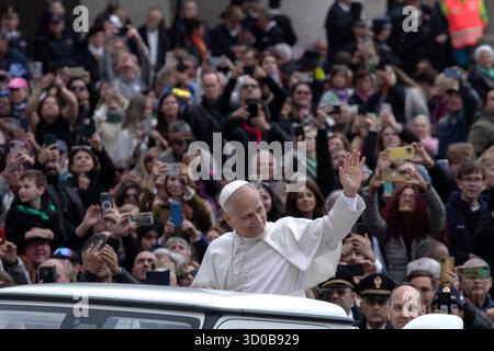Pope Leo XIV waves as he arrives for his weekly general audience in St ...
