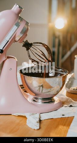 Pouring cake batter into the mug to prepare pumpkin mug cake Stock ...