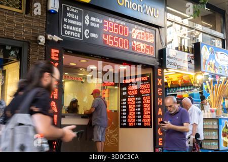 A Turkish currency exchange office in a busy shopping district of ...