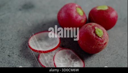 Fresh radishes, whole and sliced Stock Photo - Alamy