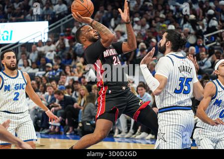 Miami Heat guard Norman Powell (24) looks to shoot over New York Knicks ...