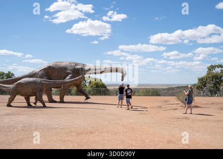 Bronze statues of sauropods and coelurosaurs outside the "March of the ...