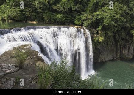 Shifen waterfall view. The waterfall is located near Shifen old town ...