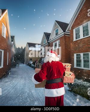 Santa Claus giving a stack of gifts Stock Photo - Alamy