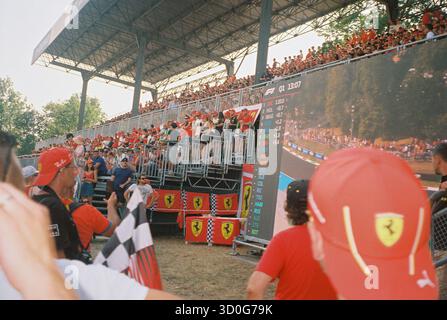 Fans watch qualifying and a Ferrari flag flies. Spanish Grand Prix ...