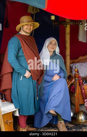 Two medieval re-enactors in medieval costume Stock Photo - Alamy