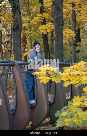 Moscow, Russia - October 12, 2025: Woman in a green quilted jacket and ...
