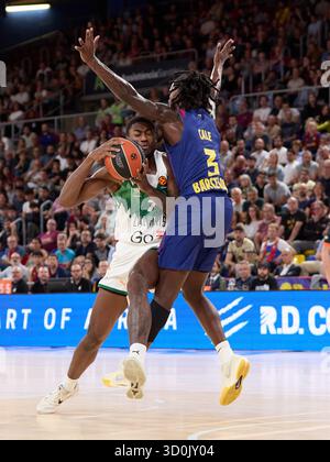 Myles Cale of FC Barcelona in action with Hamidou Diallo of Baskonia ...