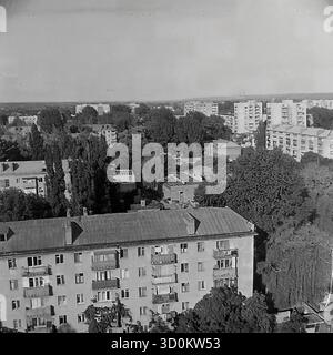 Panoramic view typical apartment complex with detached garage, covered ...