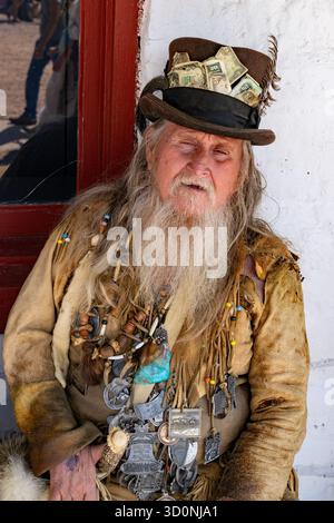 A man in mountain man buckskins at the Fort Bridger Rendezvous at the ...