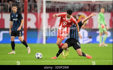from left Aleksandar Pavlovic (Bayern), goalkeeper Kamil Grabara ...