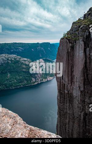A breathtaking view from a cliff overlooking a lush forest Stock Photo ...