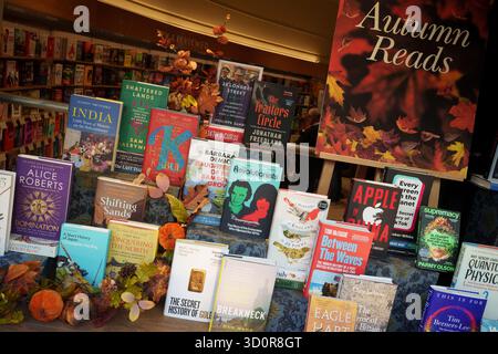 Book list for autumn season. Intellectual hobby. Girl sit bench ...