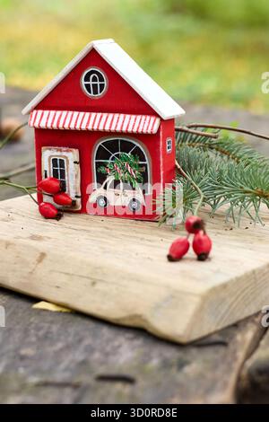 Wooden car carrying a christmas tree in front of dreamy and abstract ...