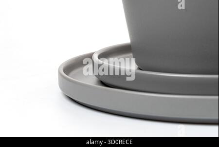 Set of stylish clean tableware on light background. Different color ...