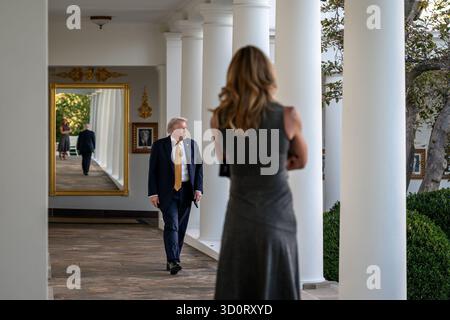 President Donald Trump walks on stage before speaking at the America ...