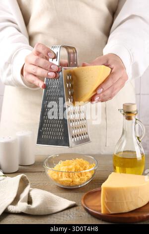 Yellow shredded natural cheddar cheese in the bowl Stock Photo - Alamy