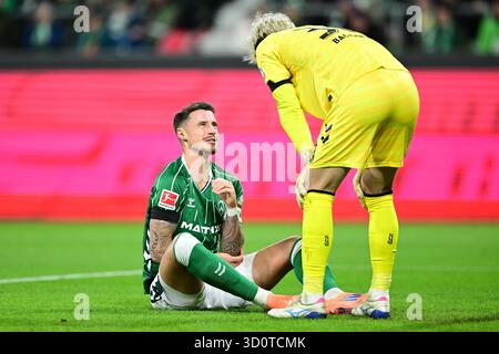 From left: Marco Friedl, goalkeeper Mio Backhaus (Bremen) Sinsheim, May ...