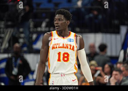 Atlanta Hawks forward Mouhamed Gueye (18) is defended by Orlando Magic ...