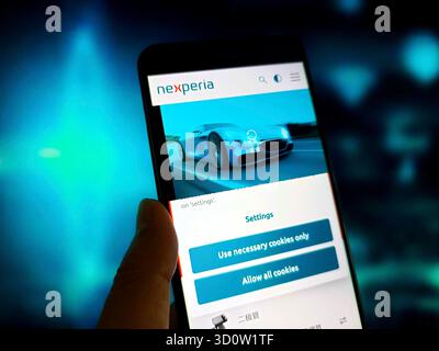 In this photo illustration, a Nexperia logo is displayed on a ...