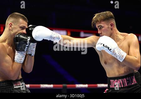 Artjom Spatar (left) and Jimmydean Wood in the super welter weight bout ...