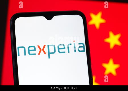 In this photo illustration, a Nexperia logo is displayed on a ...