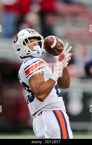 Auburn running back Jeremiah Cobb (23) is tackled by Alabama defensive ...