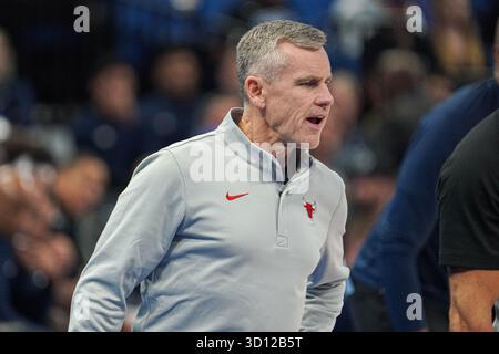 Chicago Bulls head coach Billy Donovan left, talks with Rob Dillingham ...