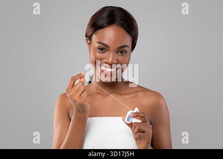 Oral hygiene and health care, smiling women use dental floss white ...