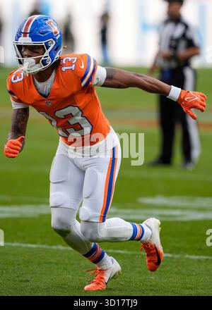 Denver Broncos wide receiver Pat Bryant (13) runs with the ball against ...