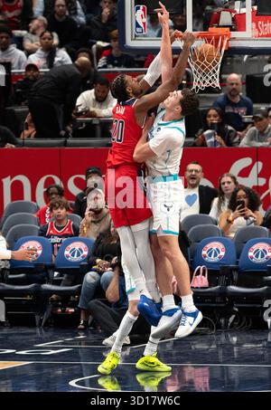 Washington Wizards center Alex Sarr dunks the ball during the first ...