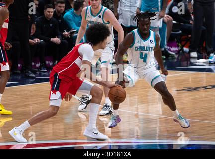 Charlotte Hornets guard Sion James stands on the court during the ...