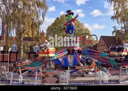 Fairground ride with figure of Disney character Jiminy Cricket England ...