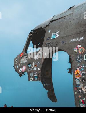 Abandoned old airplane with colorful graffiti at an airport in the ...