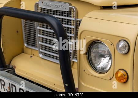 Front view of an iconic yellow Land Rover Discovery Camel Trophy ...