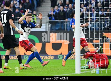 from left: goalkeeper Kamil Grabara (Wolfsburg), Yannick Gerhardt ...