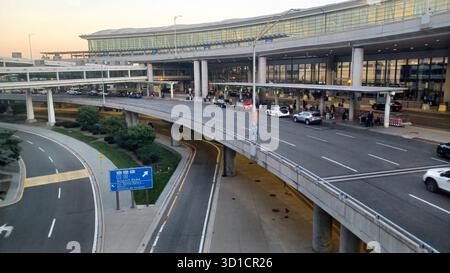 Toronto, Canada - October 15, 2025: Cars and passengers are seen ...