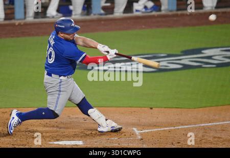 Toronto Blue Jays' Alejandro Kirk breaks his bat as he grounds out into ...