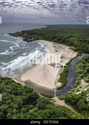 A beautiful view of a sandy beach near the sea Stock Photo - Alamy